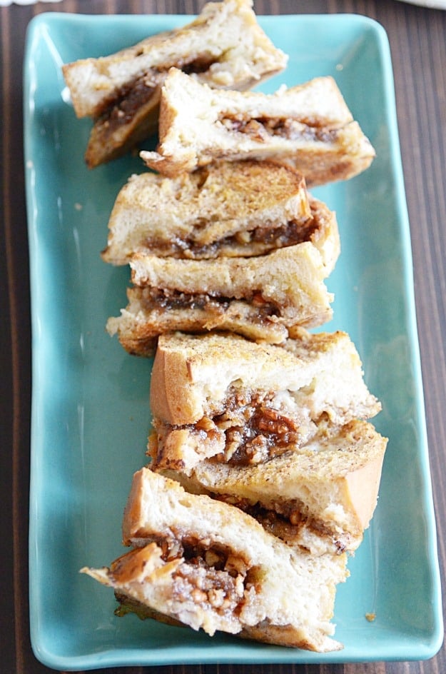 Cinnamon Roll Stuffed Baked French Toast Recipe - Something Swanky