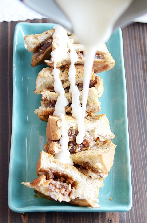 Cinnamon Roll Stuffed Baked French Toast Recipe - Something Swanky